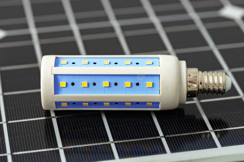 Solar Energy Panel and Light Bulb, Green Energy Concept Stock Photo ...
