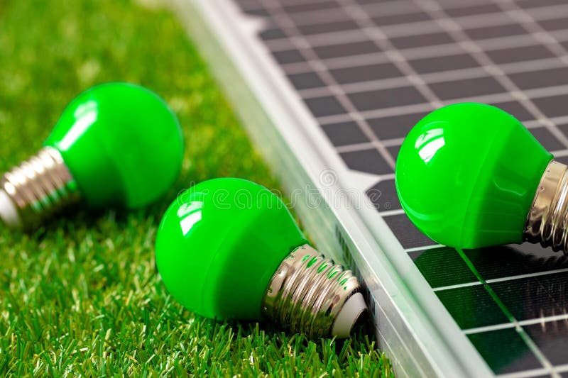 Solar Energy Panel and Light Bulb, Green Energy Concept Stock Photo ...