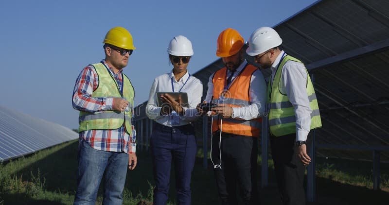 Solar Farm Engineers Launch Drone Stock Photo - Image of male, outdoors ...