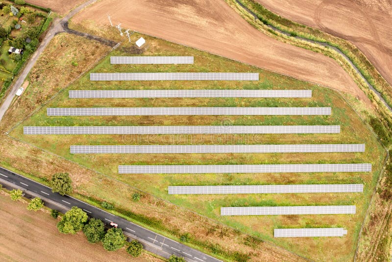 Solar Farm on the Field, Many Solar Panels in a Row. Alternative Power ...