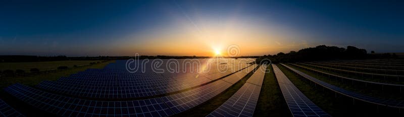 Solar Farm Panoramic at Sunrise Stock Photo - Image of sunset, light ...