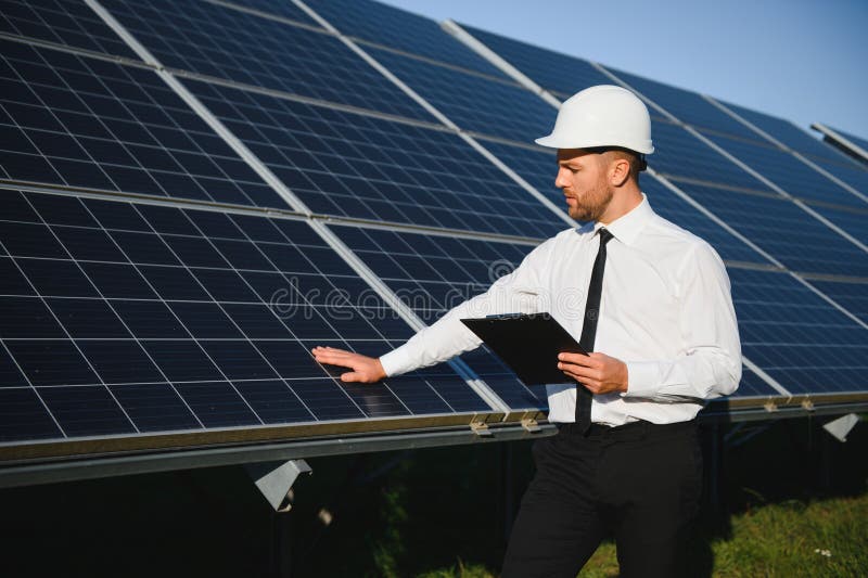 The Solar Farm, Solar Panel with Engineer Check the Operation of the ...