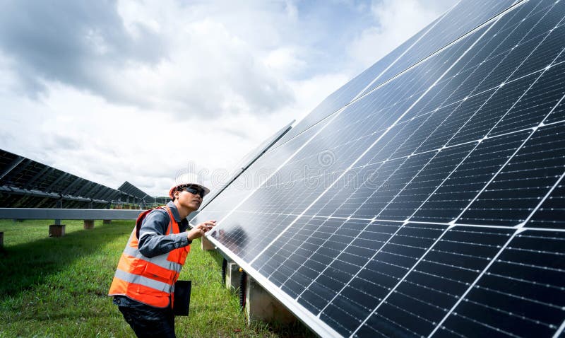 The Solar Farmsolar Panel with Engineers Check the Operation of the ...