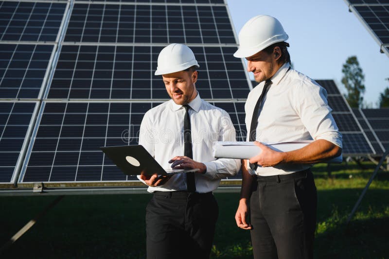 The Solar Farm, Solar Panel with Two Engineers Walk To Check the ...