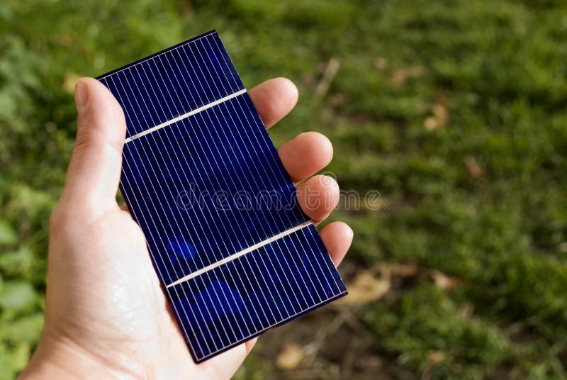 Raw solar cell in a hand stock photo. Image of hand, cell - 15304252