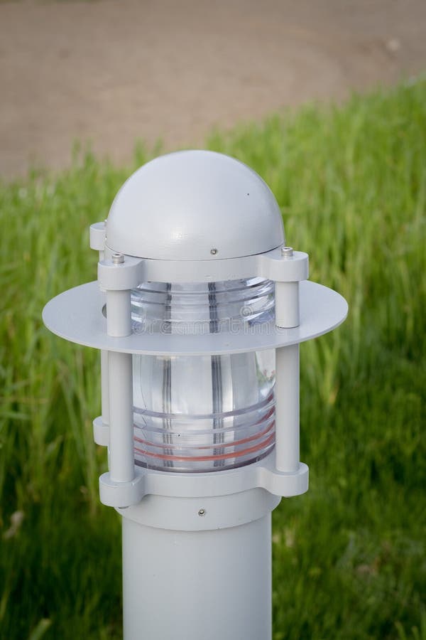 Solar Light Post at the Beach Stock Image - Image of protection, grass ...