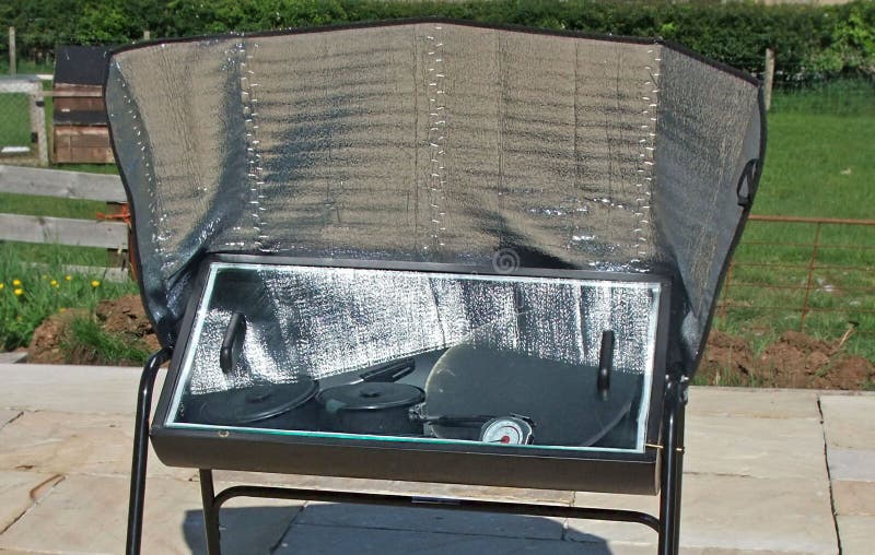 Solar Cooking in a Converted Bbq Solar Oven Stock Photo - Image of ...