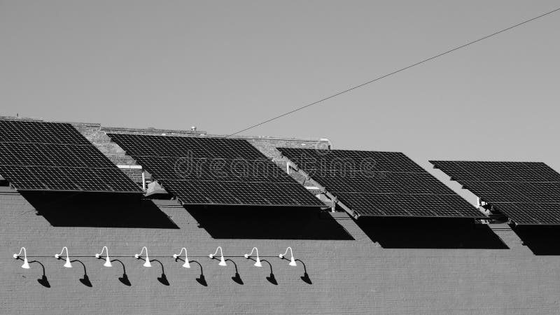 Solar Panels and Light Fixtures on Facade of Building Stock Photo ...