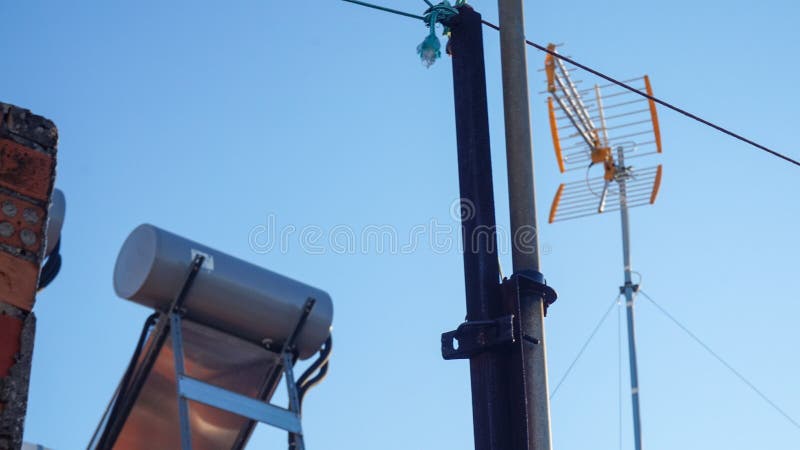 Solar Panel with Antenna on the Rooftop Stock Photo - Image of solar ...