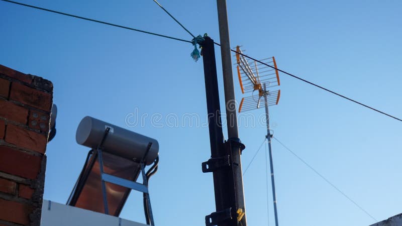 Solar Panel with Antenna on the Rooftop Stock Image - Image of roof ...