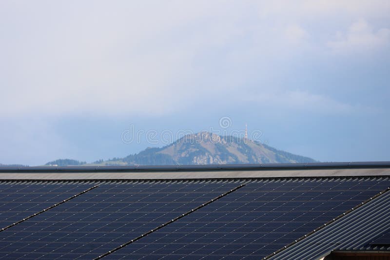Solar Panel Array is Installed on the Roof of a Building Stock Photo ...