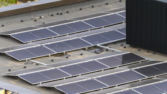 A Solar Panel Array is Installed on a Roof Stock Image - Image of clean ...