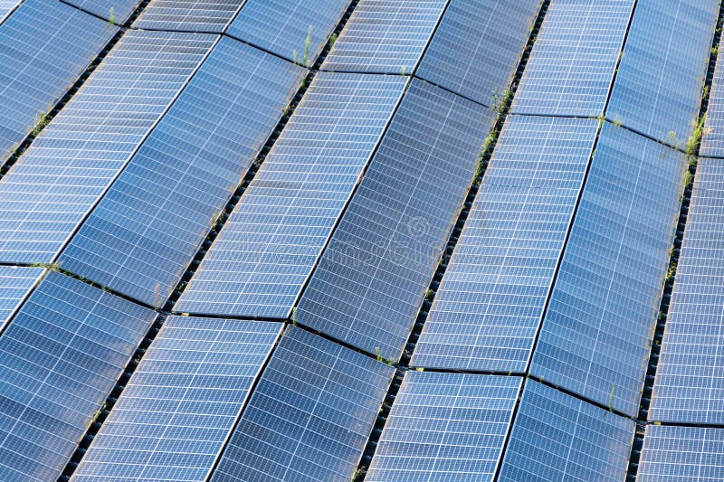 Solar Panel Farm, with Rows of Solar Panels Arranged in a Grid-like ...