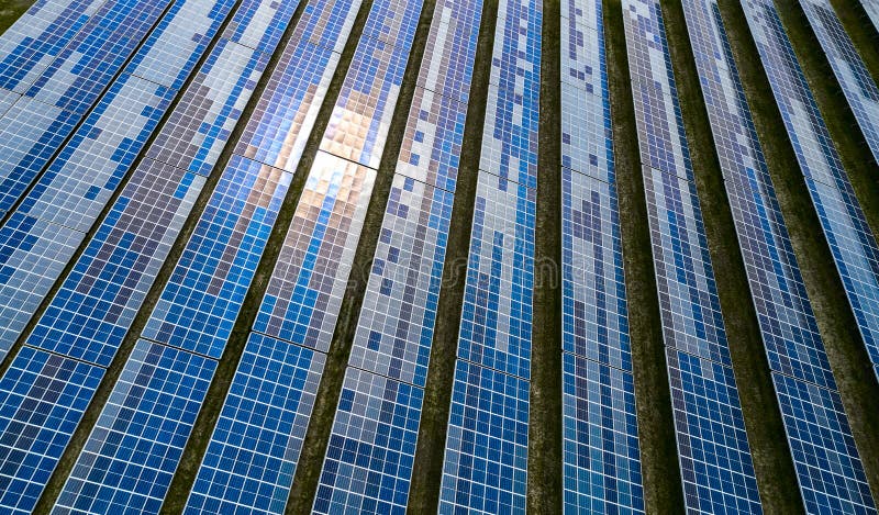 Solar Panel Field at Work with Sun Reflection Stock Image - Image of ...