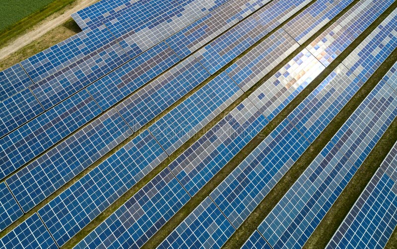 Solar Panel Field at Work with Sun Reflection Stock Image - Image of ...