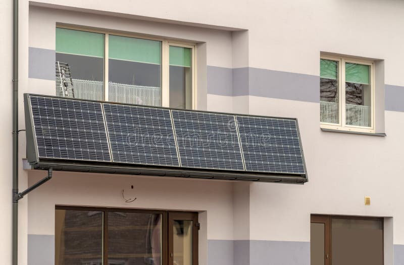 A Solar Panel for Generating Electricity Placed on the Balcony Railing ...