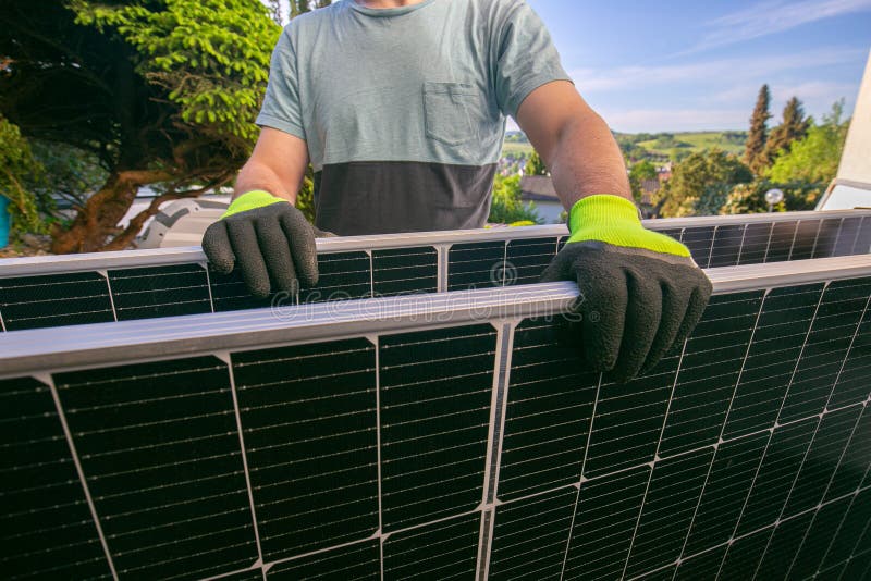 Solar Panel in the Hands of a Worker.installation of Solar Panels.Smart ...