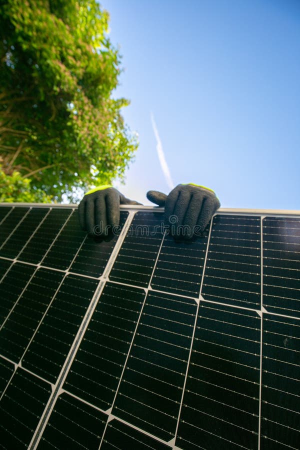 Solar Panel in the Hands of a Worker.solar Power Technology.Smart ...