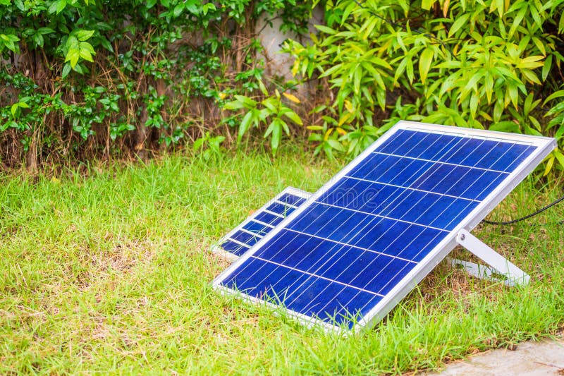 Solar panel in the garden stock image. Image of installation - 292638385