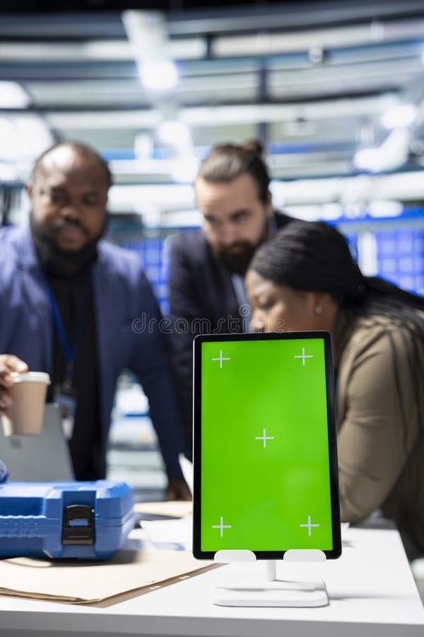 Solar Panel Inspection Group Review Data on Pc Next To Green Screen ...