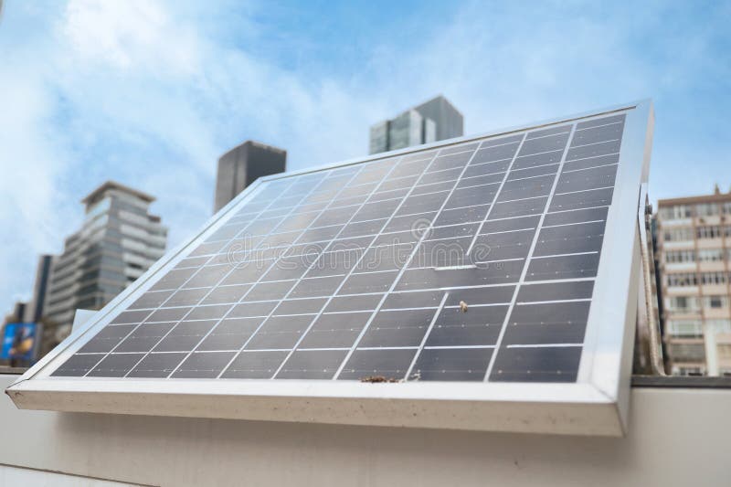 Solar Panel Installation on Rooftop in an Urban Setting Stock Photo ...