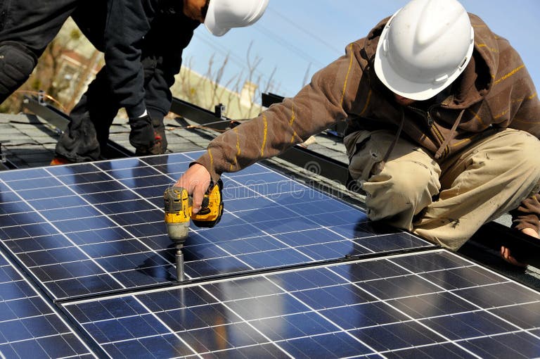 Solar Panel Installers 2 stock image. Image of energy - 18730995