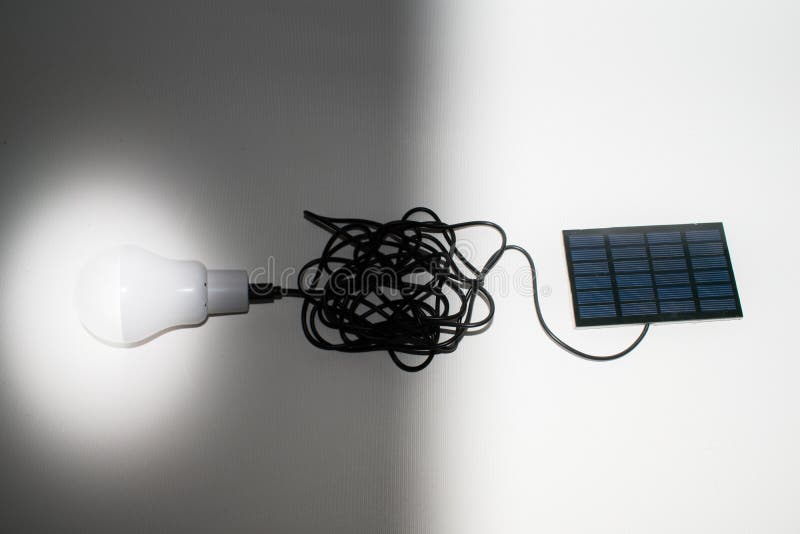 Solar panel and light bulb stock image. Image of line - 110999979