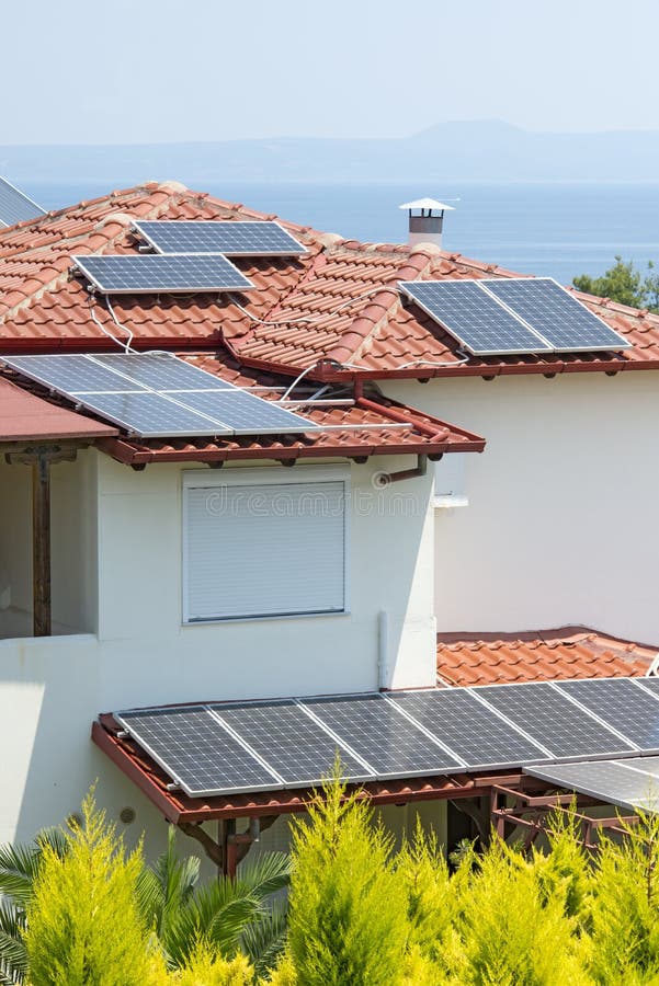 House with solar panels stock photo. Image of panels - 26961006