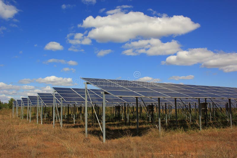Solar Panel at Solar Power Plant on Blue Sky Stock Photo - Image of ...