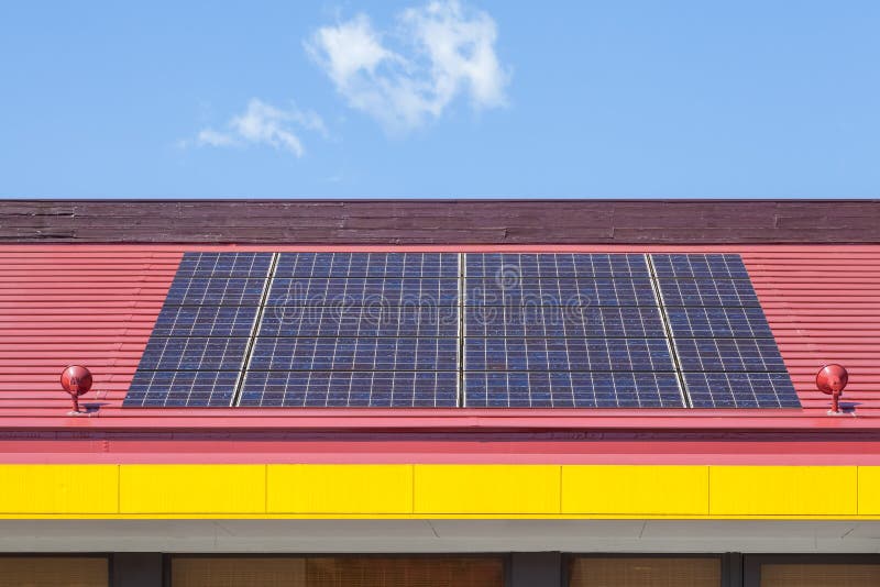 Solar panel on a red roof stock image. Image of cell - 62224007