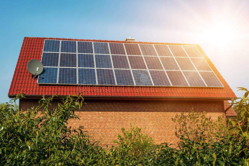 Solar panel on a red roof stock photo. Image of recycling - 79549500