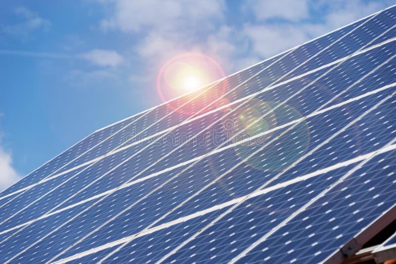 Solar Panel with Reflection of Sky and White Clouds Stock Photo - Image ...