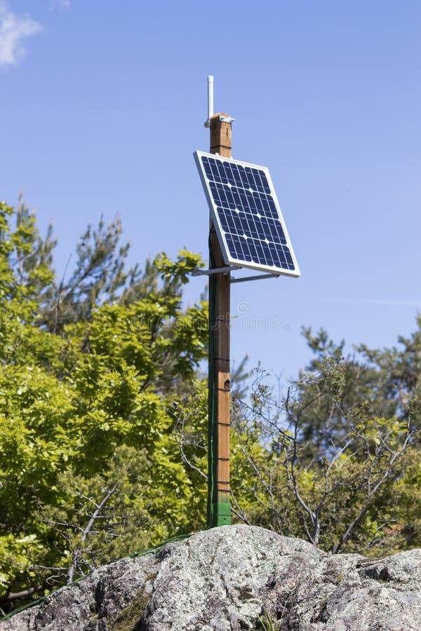 Solar Panel on a Rock in the Nature Stock Image - Image of green ...