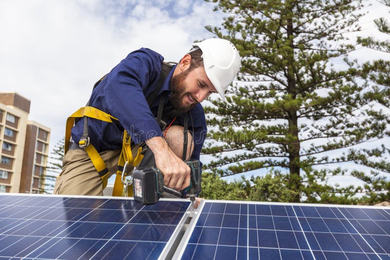 Solar panel technician stock image. Image of rooftop - 62662649