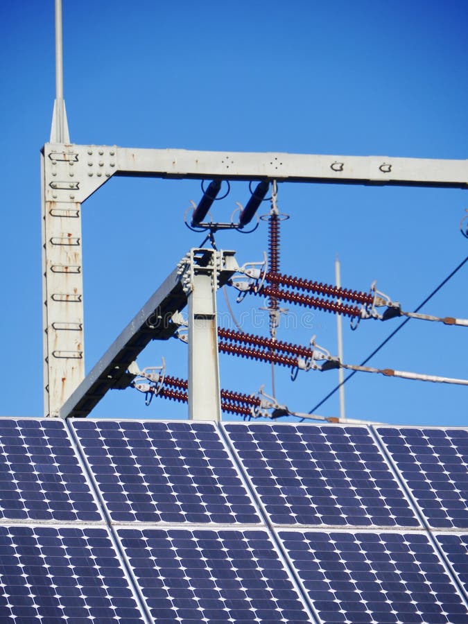 A Solar Panel is on Top of a Power Line Stock Image - Image of strom ...
