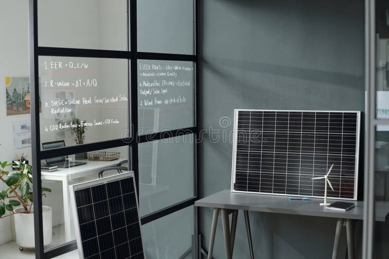 Solar Panel and Windmill Models on Desk Stock Photo - Image of ...
