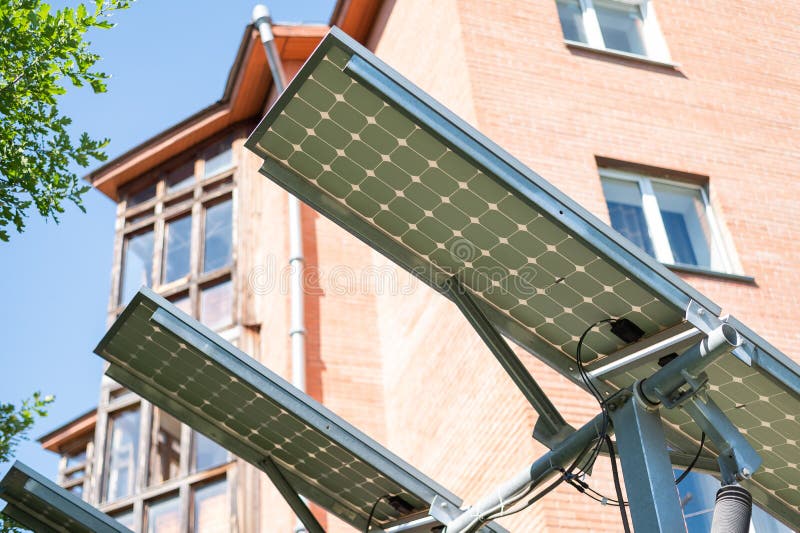 Solar Panels on the Background of a Brick House Stock Photo - Image of ...