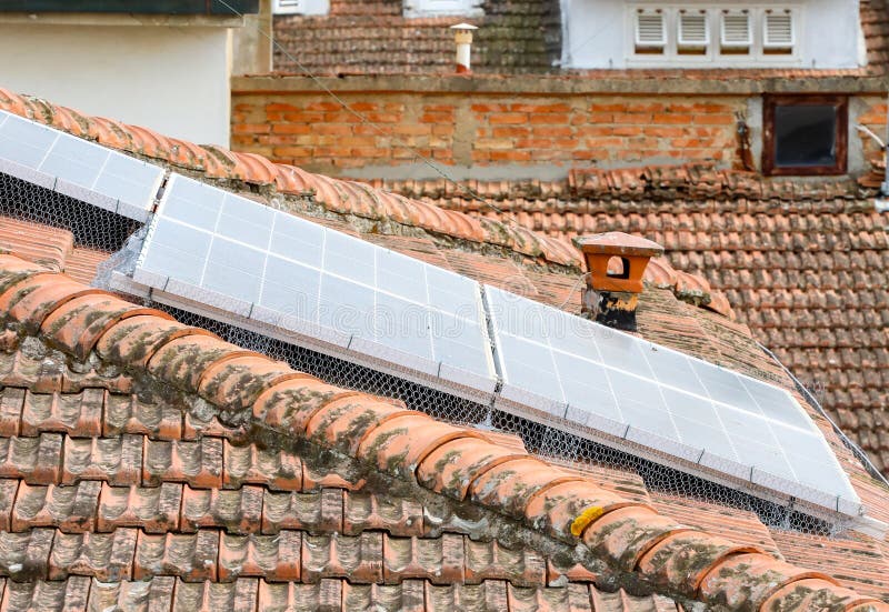 Solar Panels with Bird Protection Net on a Tiled Roof Stock Image ...