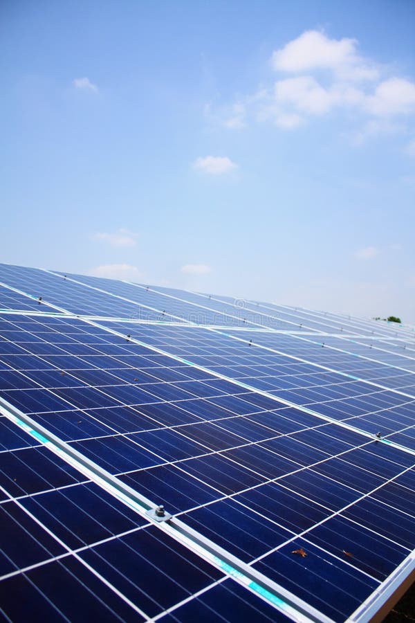Solar Panels and Wind Turbines with the Clouds and Sky Stock Photo ...
