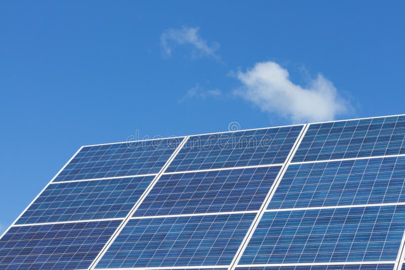 Solar panels on a blue sky stock photo. Image of nature - 78776136