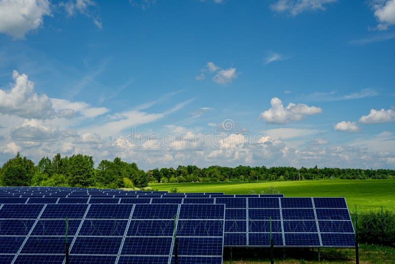 Solar Panels on a Blue Sky Background Stock Photo - Image of green ...