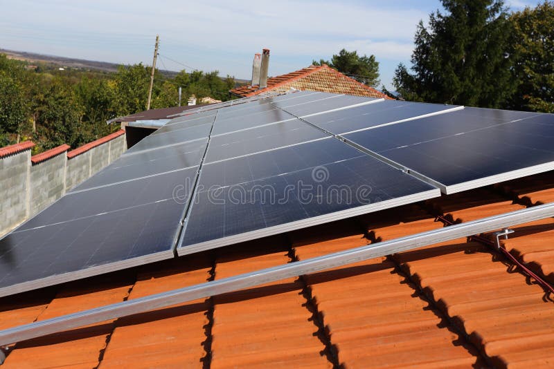 Solar panels on roof stock photo. Image of electricity - 262485994