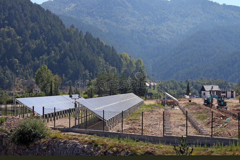 Solar Panels Construction Site Stock Photo - Image of excavator ...
