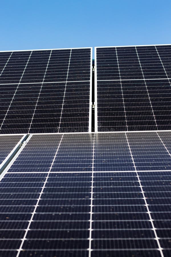 The Panels are Dark with Lighter Grid Lines that Capture Solar Energy ...