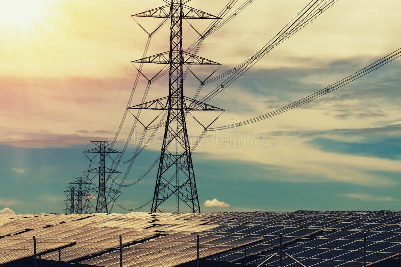 Solar Panels with Electricity Pylon and Sunset. Clean Power Energy ...