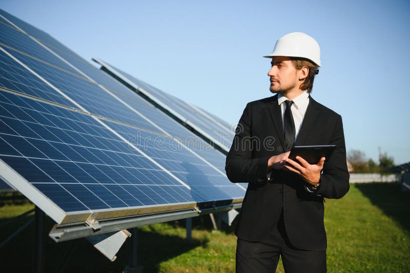 Solar Panels. Engineer Man on Solar Power Station Stock Photo - Image ...