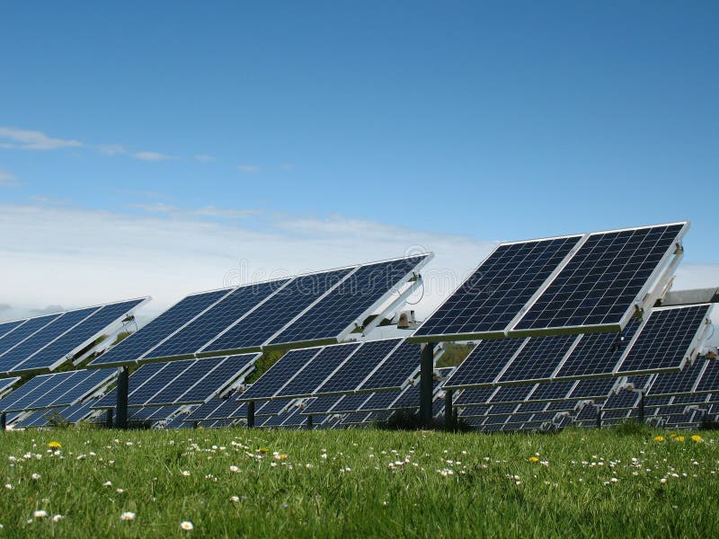 Solar panels in a field stock photo. Image of renewable - 11668292