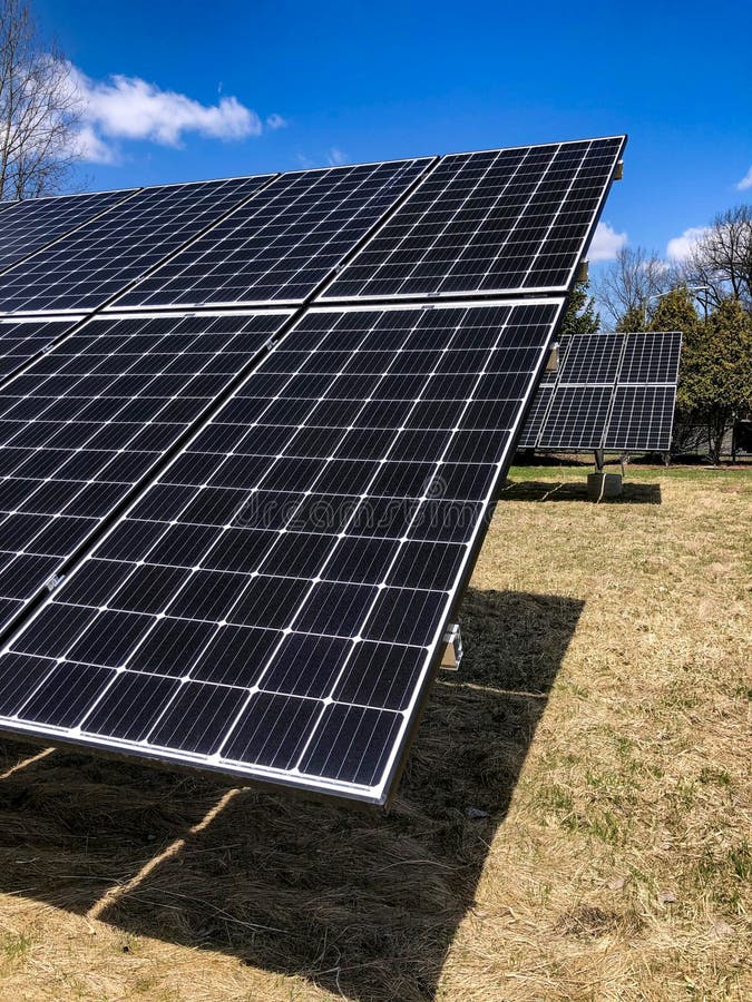 Solar panels in a field stock photo. Image of situated - 179796530
