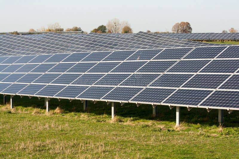 Solar Panels on a Field, Collecting Energy Stock Photo - Image of ...