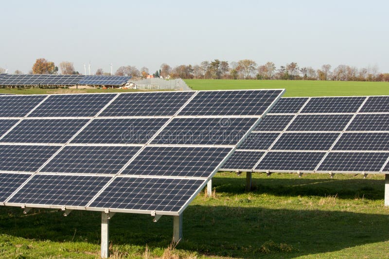 Solar Panels on a Field, Collecting Energy Stock Photo - Image of ...